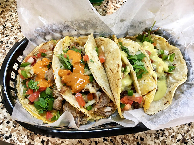 Street tacos in their natural habitat: unpretentious, straightforward, and absolutely irresistible. No filter needed for this kind of beauty.