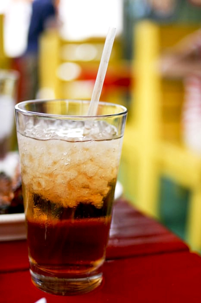 Sweet tea in a plastic cup—the unofficial state beverage of Georgia, served with enough sugar to make your dentist buy a new boat.