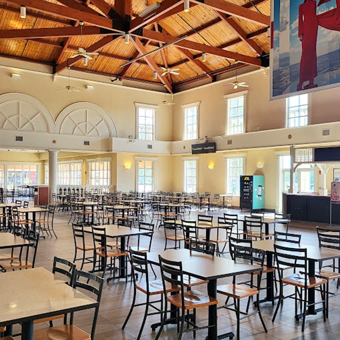 Soaring ceilings and abundant seating make this dining area feel more upscale than your typical mall food court experience.