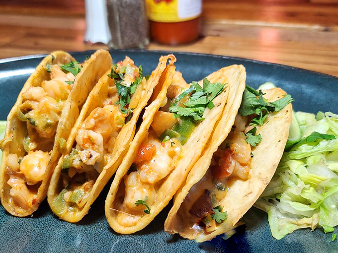 Shrimp tacos that bring the coastal vibes inland &ndash; each one packed with plump morsels swimming in just the right amount of sauce.