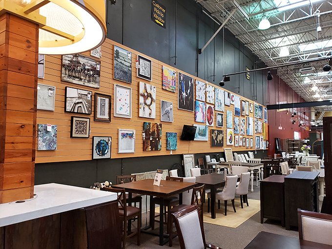 A gallery wall that could make museum curators jealous, proving furniture shopping and art appreciation aren't mutually exclusive activities.