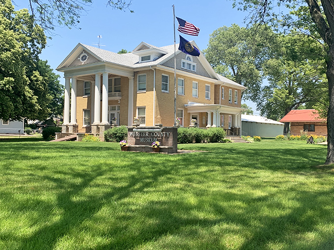 History preserved in yellow brick. The Webster County Museum houses the collective memory of generations who called this prairie home.