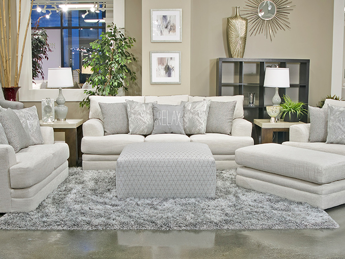 A living room vignette so perfectly styled it makes you wonder if your own home will ever achieve this level of "together" without professional intervention.