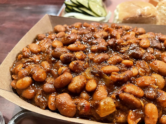 These aren't your sad, straight-from-the-can baked beans. They've clearly been hanging out with brisket drippings and having a good time.