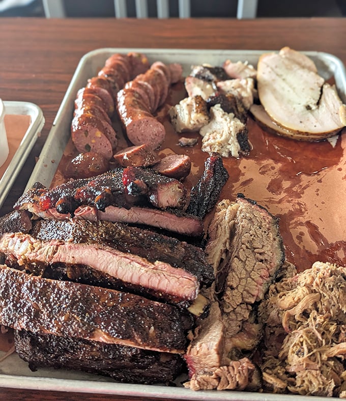 The barbecue sampler platter&mdash;where decision anxiety meets its match. When everything looks this good, the only wrong choice is not ordering enough.
