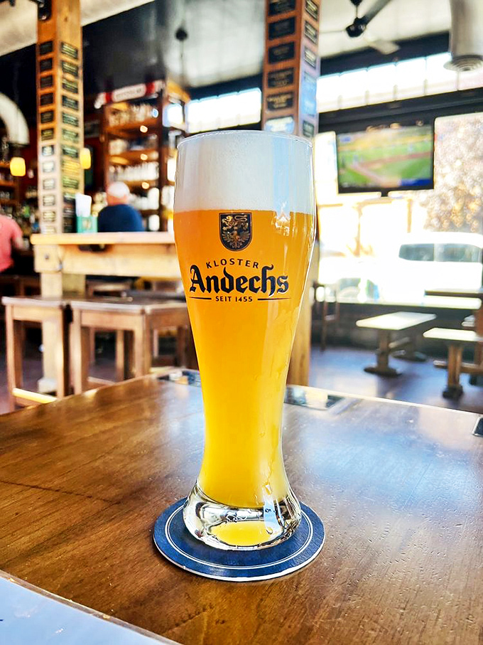 Liquid gold in a proper glass. This Andechs wheat beer isn't just a drink&mdash;it's centuries of brewing tradition in one sip. 