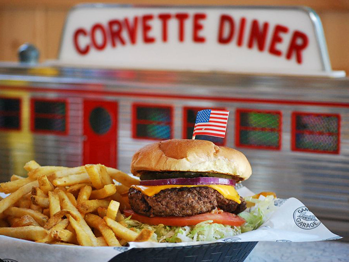 The all-American burger arrives with a patriotic flag, as if to say "this is what freedom tastes like"&mdash;juicy, cheesy freedom.