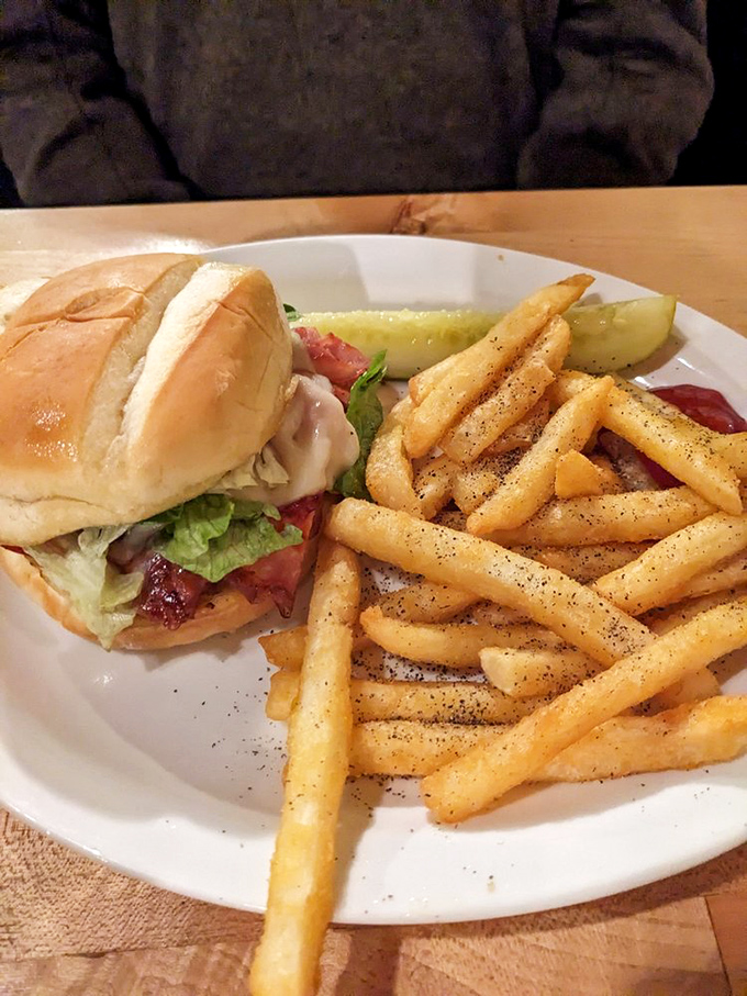 A sandwich that doesn't need to show off, paired with fries seasoned just right. Sometimes lunch perfection comes on an unpretentious white plate.