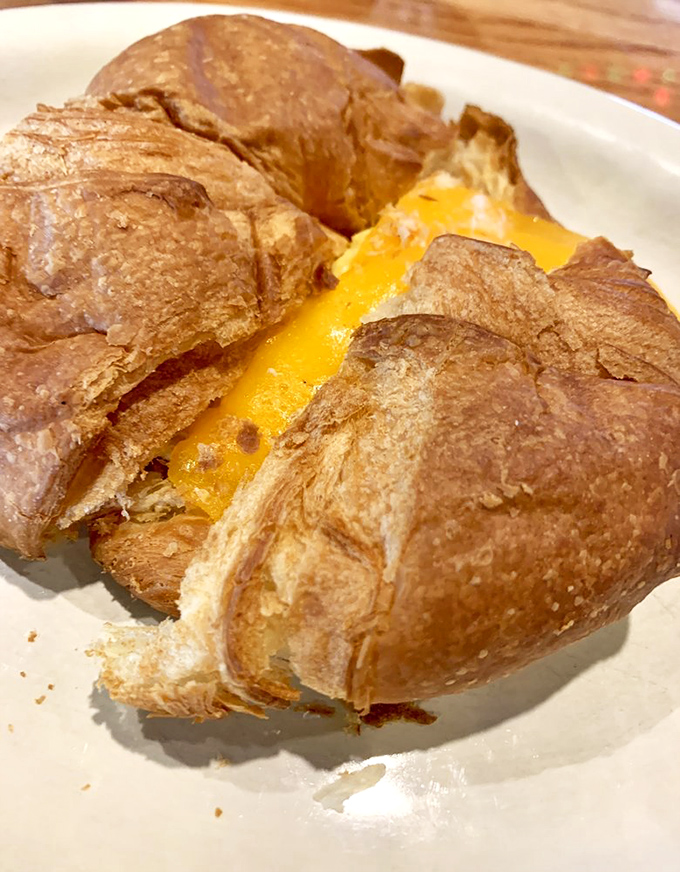 This isn't just a croissant&mdash;it's a cheese-filled miracle of butter and flakiness. The kind of pastry that makes you momentarily forget about your cholesterol numbers.