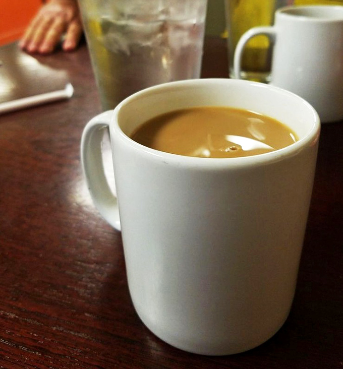 Coffee: That classic white mug &ndash; the unsung hero of diners everywhere &ndash; delivering liquid motivation without pretension.