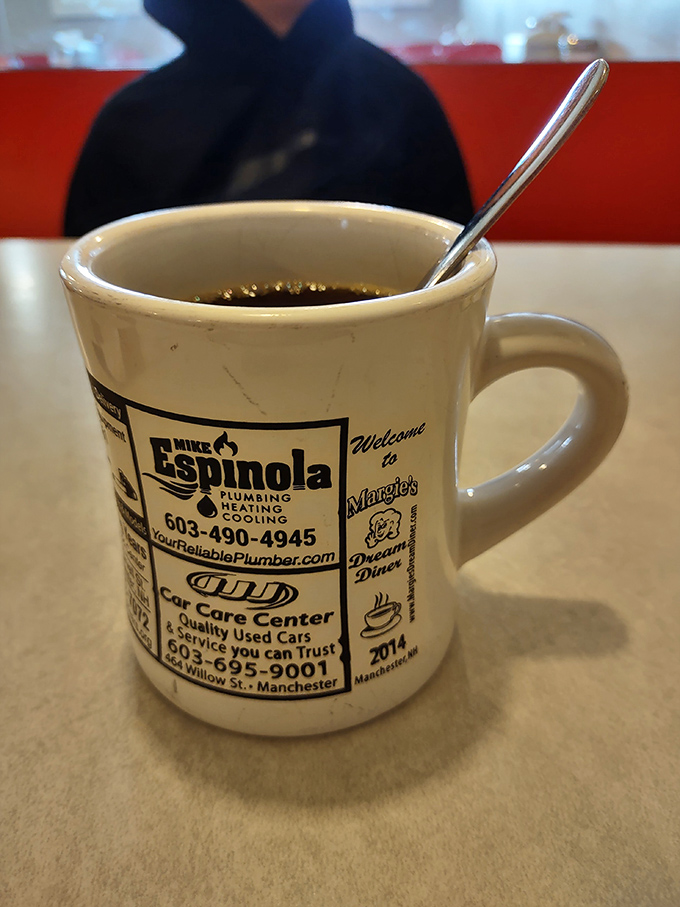 Coffee served in a mug that tells stories of local businesses. In diners like Margie's, a full coffee cup is practically a constitutional right.