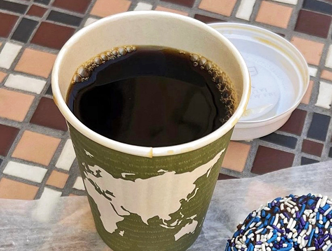 Coffee in a paper cup&mdash;the humble sidekick to every great donut adventure. Batman has Robin, donuts have coffee.