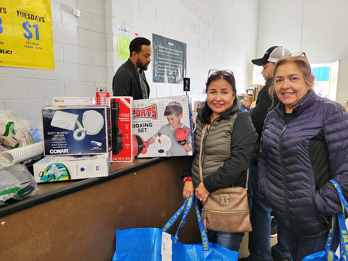 Victory at the checkout counter! Those smiles aren't just about saving money &ndash; they're about the thrill of the unexpected find.