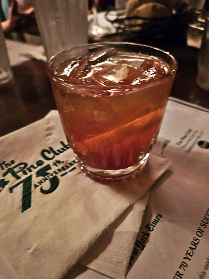 This isn't just a cocktail; it's a time machine in a glass, mixed with the same care and precision that's kept locals coming back for generations.