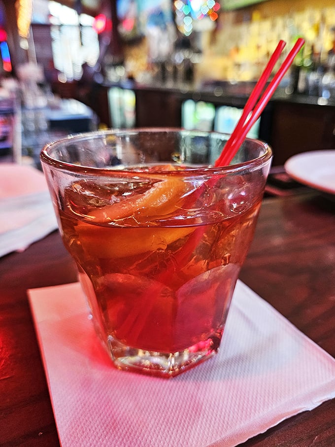 A cocktail that's dressed better than most people at the party. Those red straws aren't just for sipping&mdash;they're your ticket to flavor town.