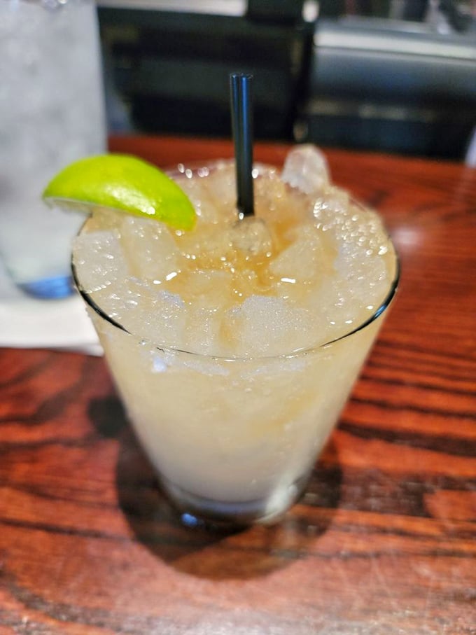 The forgotten art of the perfect cocktail lives on here. That lime wedge isn't just garnish&mdash;it's the exclamation point on a well-crafted sentence.