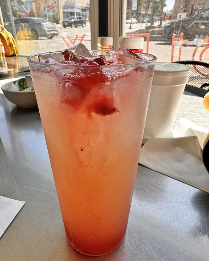 That pink drink isn't trying to be fancy—it's just trying to make your day better. And judging by its color, mission accomplished.