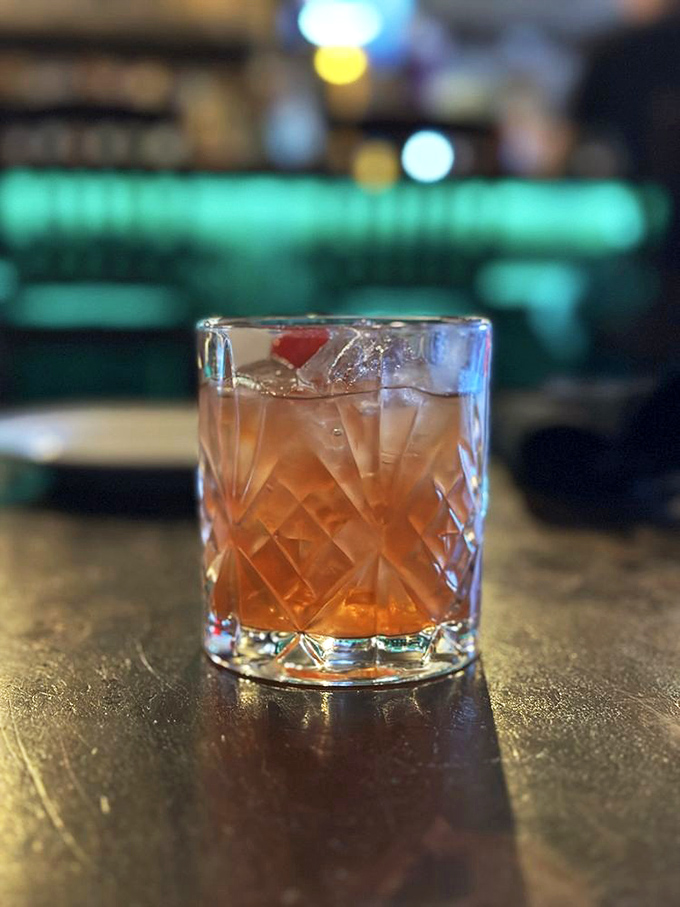 A proper Irish whiskey served in crystal that catches the pub light like liquid amber poetry in motion.