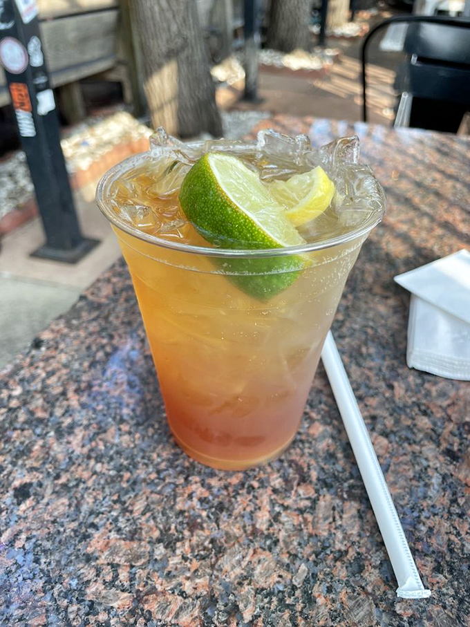 This isn't just a cocktail; it's liquid sunshine in a glass, garnished with citrus and promising good decisions or interesting stories – your choice.