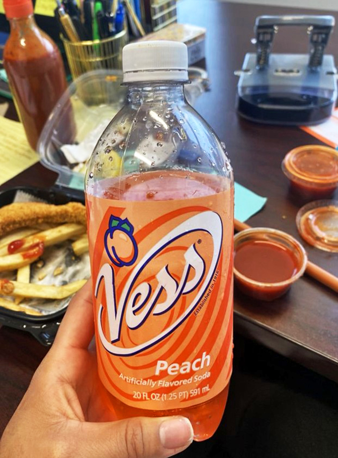 Nothing complements fried seafood quite like an ice-cold Peach Nehi&mdash;a sweet, nostalgic counterpoint to the savory feast.