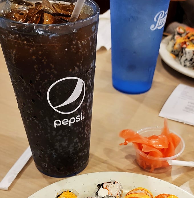 That moment when your Pepsi arrives in a glass bigger than some small apartments. Hydration is serious business at an all-you-can-eat marathon.