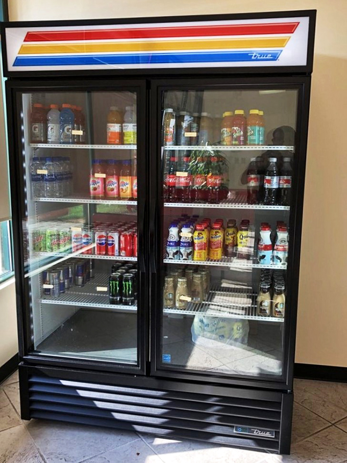 The beverage cooler stands ready&mdash;because even superheroes need sidekicks, and every great donut deserves a worthy drink companion.