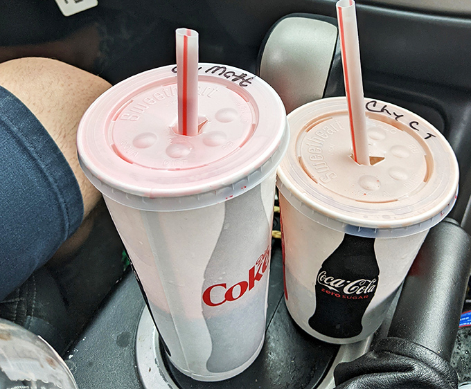 Classic sodas in those perfectly tapered cups&mdash;where the last sip somehow tastes better than the first. The plastic straw feels rebelliously nostalgic. 