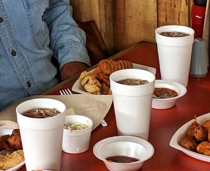 Sweet tea in styrofoam cups&mdash;the unofficial champagne of the South&mdash;accompanies hushpuppies and fried delights at this lakeside institution.