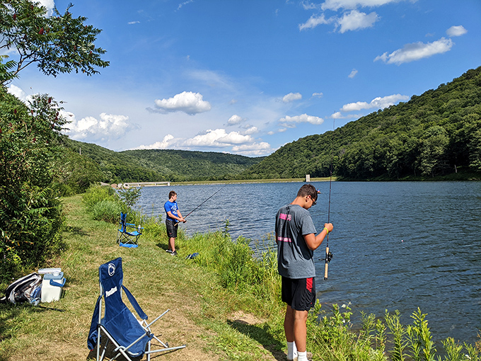 Anglers find their happy place along these pristine shores. The lake's clear waters reveal the underwater dance of trout just waiting for the perfect cast.