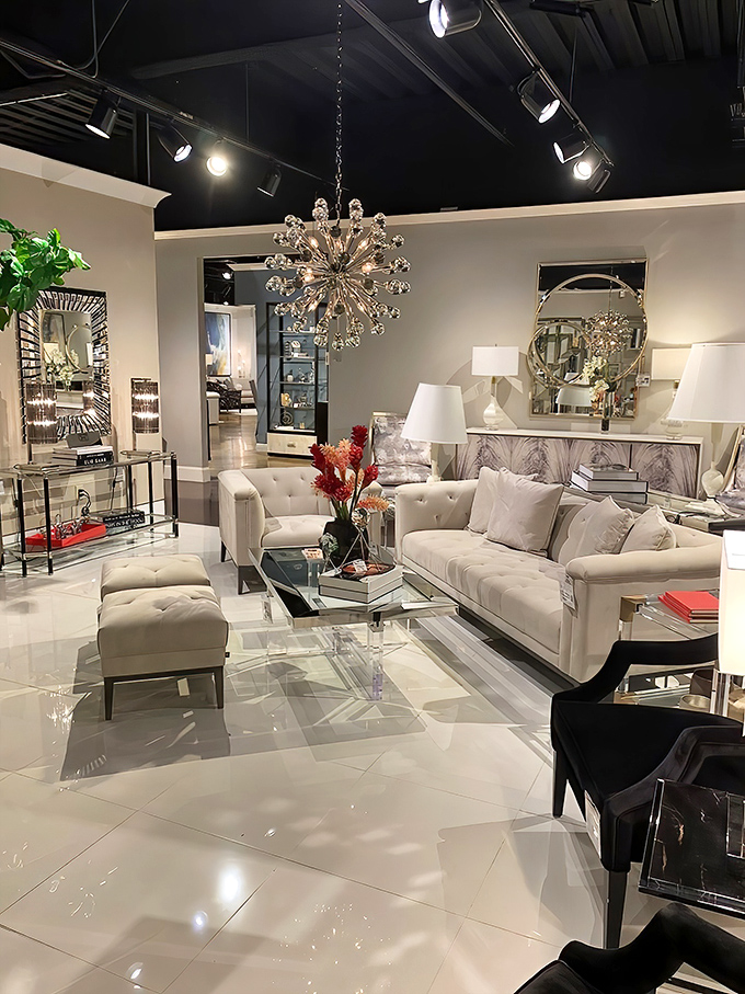 Chandelier drama meets pristine white elegance. This showroom vignette is what your living room looks like in your dreams.