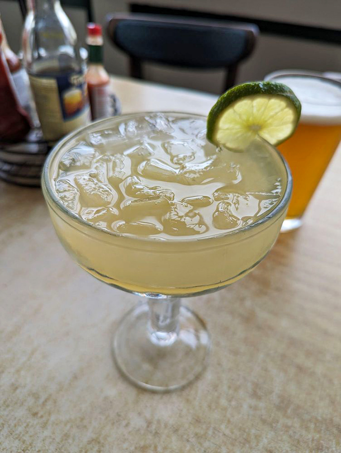 A proper margarita: the lime perched on the rim like a diver about to take the plunge. The perfect companion for seafood feasting.