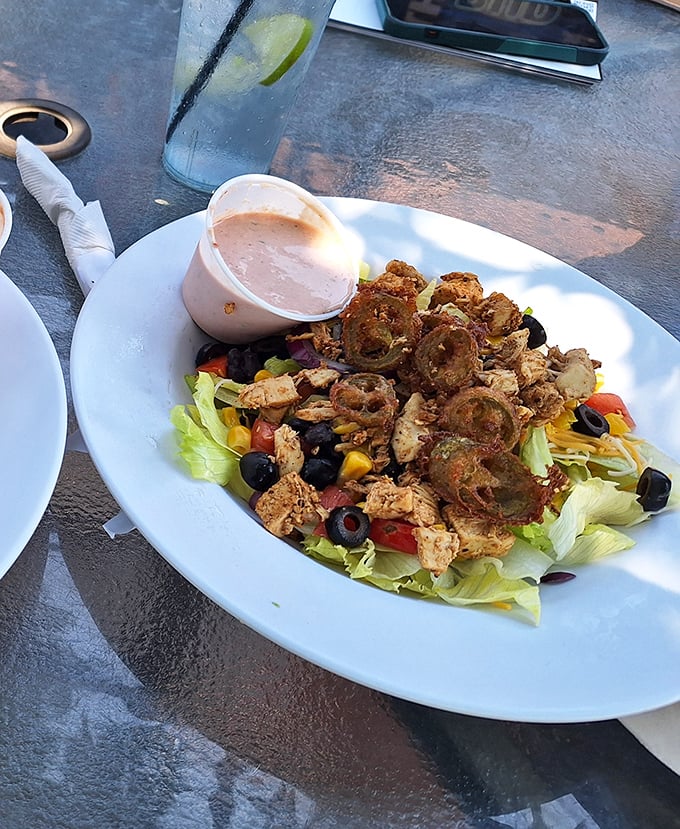 Garden fresh meets protein perfection in this southwestern-inspired salad. Those crispy chicken bits are what salad croutons wish they could be.