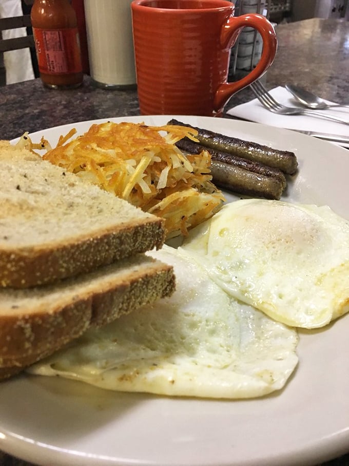 Morning poetry: golden hash browns with their crispy edges, eggs with just-set whites, and toast waiting patiently for its butter bath.