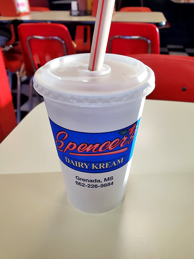 Even their cups come dressed for the occasion, sporting the iconic Spencer's logo&mdash;a portable vessel of joy for those who prefer their happiness to go.