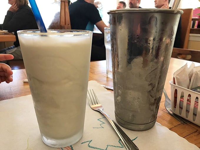 That classic diner shake in a frosty metal mixing cup brings back childhood memories, when "brain freeze" was a badge of honor worth earning.