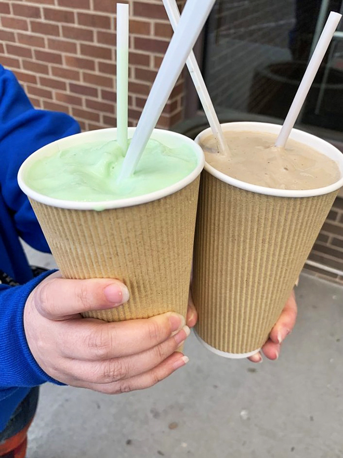 Two milkshakes plotting world domination &ndash; one mint green, one classic vanilla &ndash; both thick enough to make your straw stand at attention. 