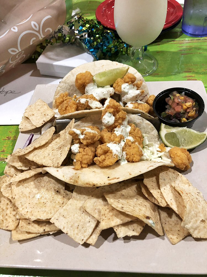 Tacos that make Tuesday feel like Friday! Crispy shrimp nestled in soft tortillas with a drizzle of sauce that ties everything together perfectly.