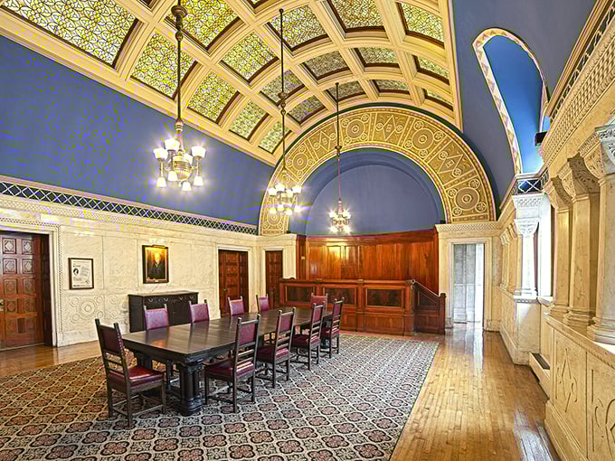 Not your average meeting room! This elegant space with its stained glass ceiling makes even a simple conversation feel historic.