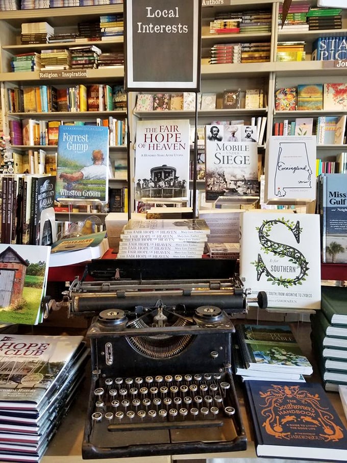A vintage typewriter anchors the local interest section, a poetic nod to the writers who've captured Alabama's complex soul through the decades.