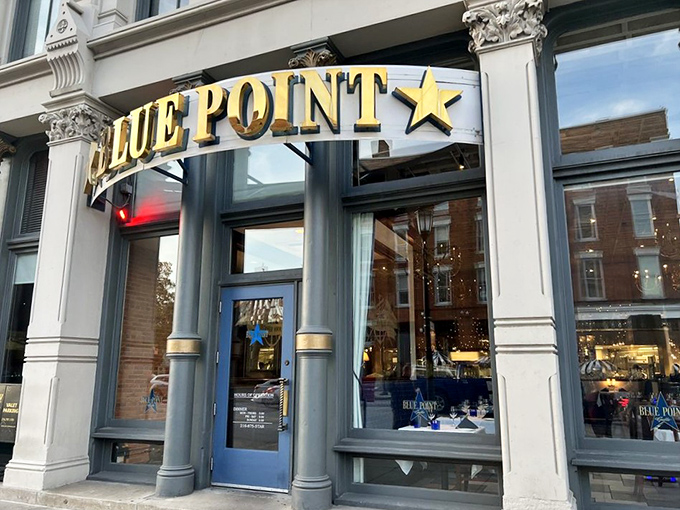 Blue Point Grille: Urban elegance meets oceanic abundance. That golden sign promises a seafood experience that respects both tradition and innovation.