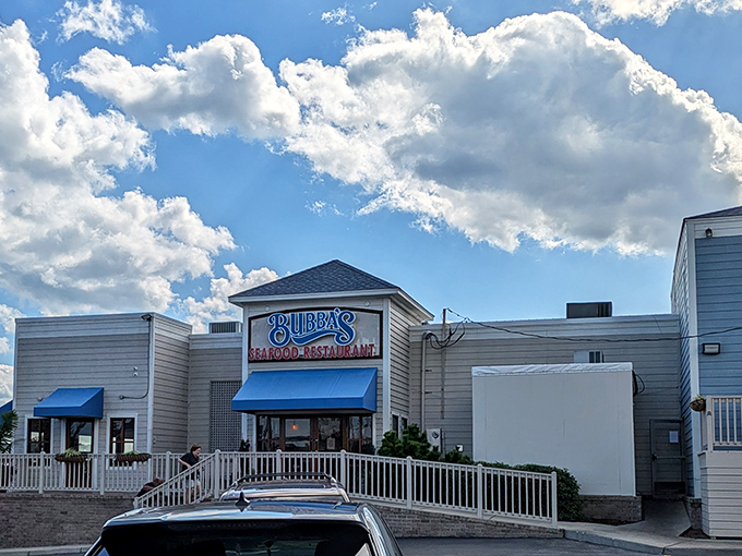 Bubba's clean white exterior with blue awnings promises seafood without pretense&mdash;just the way the locals like it.