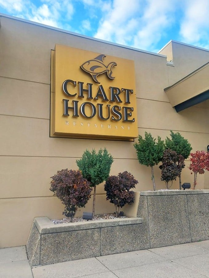 Chart House's golden sign gleams with understated elegance &ndash; a hint that while fancy, the focus remains squarely on exceptional seafood.