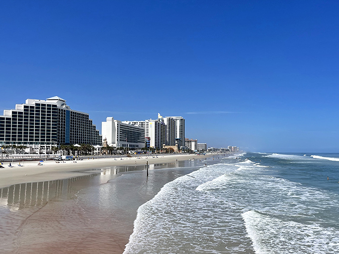 Daytona's iconic beach stretches toward the horizon. Those waves have been calling to sun-seekers for generations!