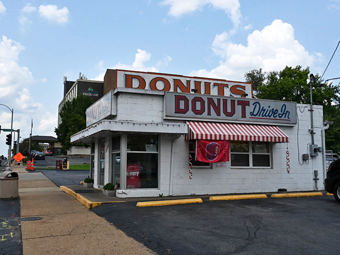 Donut Drive-In's vintage white building with red trim is a time capsule of simpler days when calories weren't counted.
