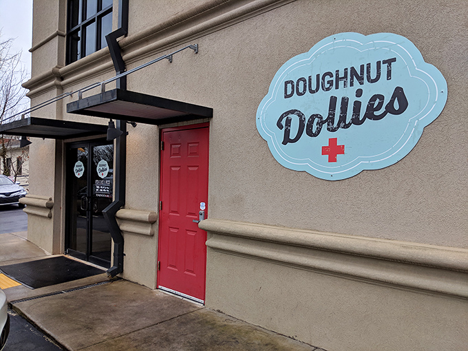 The cloud-shaped sign reminds us that great donuts can indeed take us to our happy place.