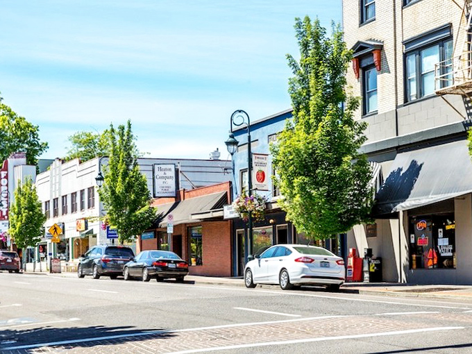Tree-lined streets lead to a downtown where your "usual" awaits at the caf&eacute; and conversations bloom as naturally as the flowers.