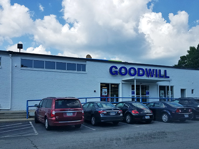 The blue Goodwill sign&mdash;like a beacon of hope for bargain hunters and budget-conscious decorators everywhere.