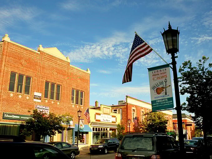 Houghton's historic downtown buildings line streets where copper mining history meets modern small-town living in perfect harmony.
