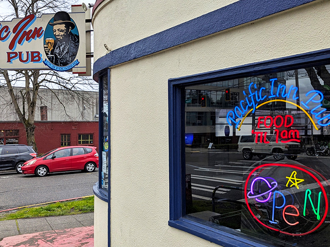 Pacific Inn's vintage neon sign glows with promise. Behind that humble exterior lurks legendary fish and chips!