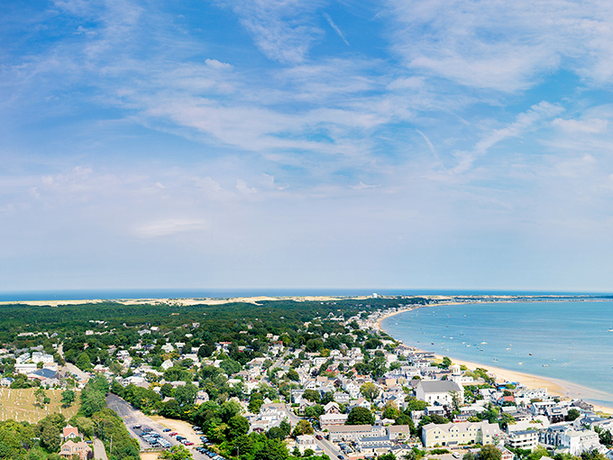 Admire the breathtaking coastal views of Provincetown from above, where golden sands meet the sparkling blue waters of the Atlantic.